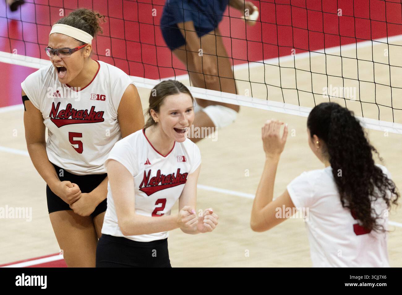Nebraska's Rebekah Allick (5), Bergen Reilly (2) and Virginia Adriano ...