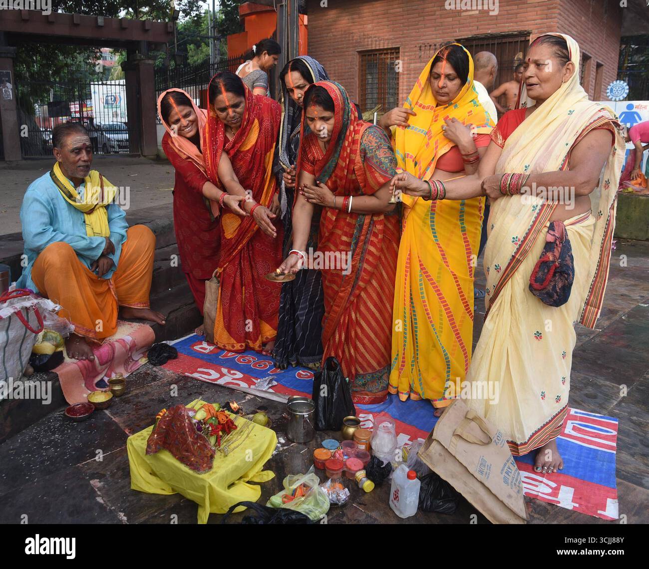 PATNA, INDIA - SEPTEMBER 6: People worshiping on the occasion of the ...