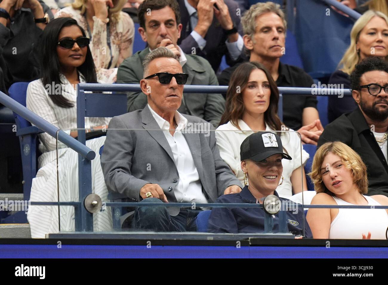Pink, front left, and Bruce Springsteen, center, attend the men's ...