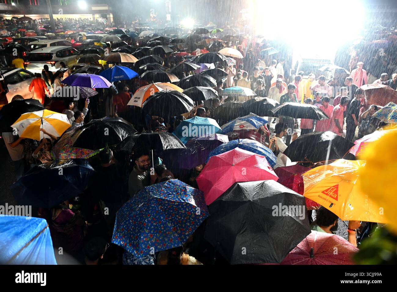 NAVI MUMBAI, INDIA - SEPTEMBER 6: Devotees immerse idols of Lord Ganesh ...