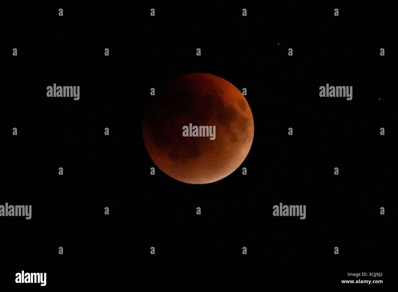 The moon turns red during a lunar eclipse ain Kolkata, India, Sunday ...