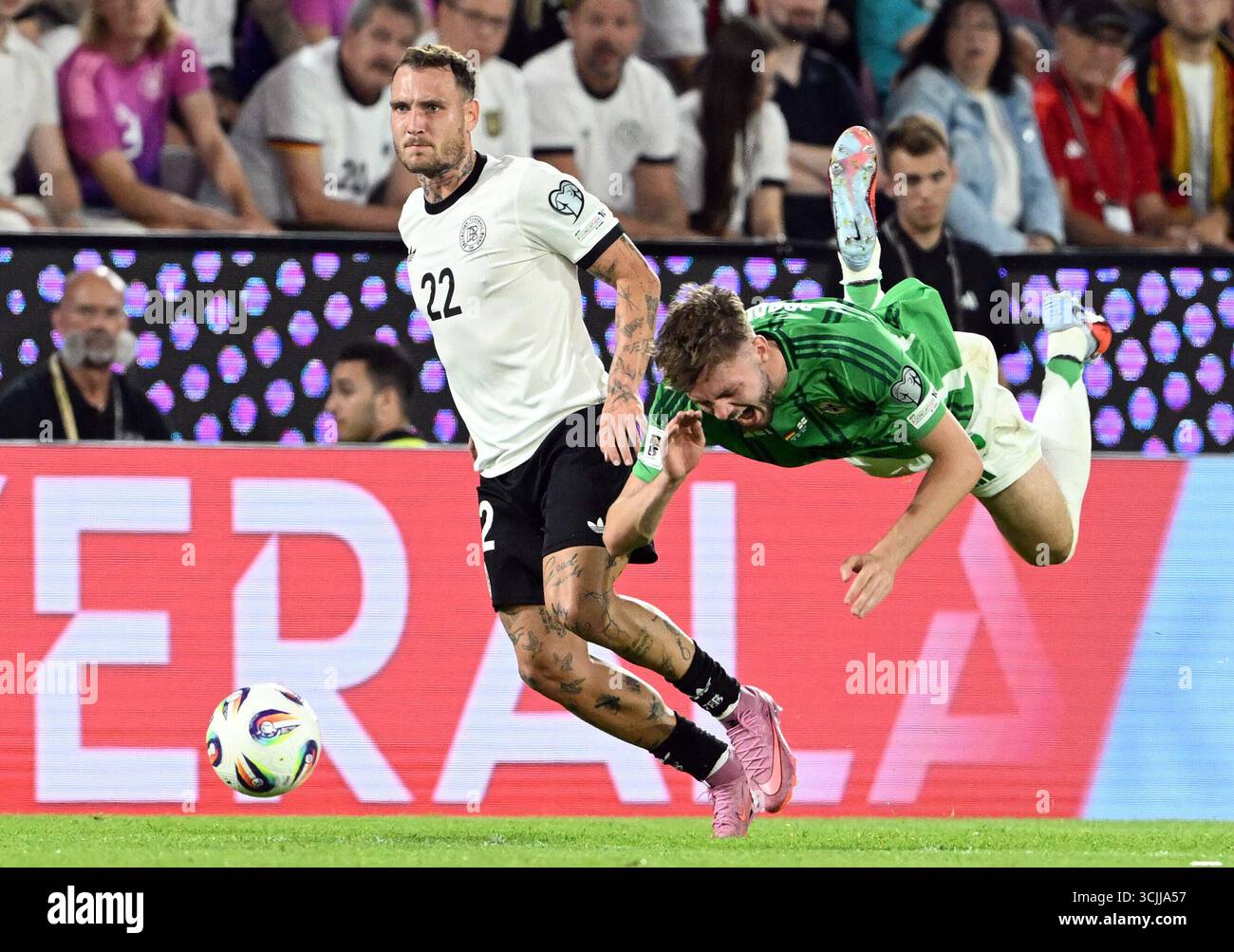 Germany's David Raum and Northern Ireland's Conor Bradley during the ...