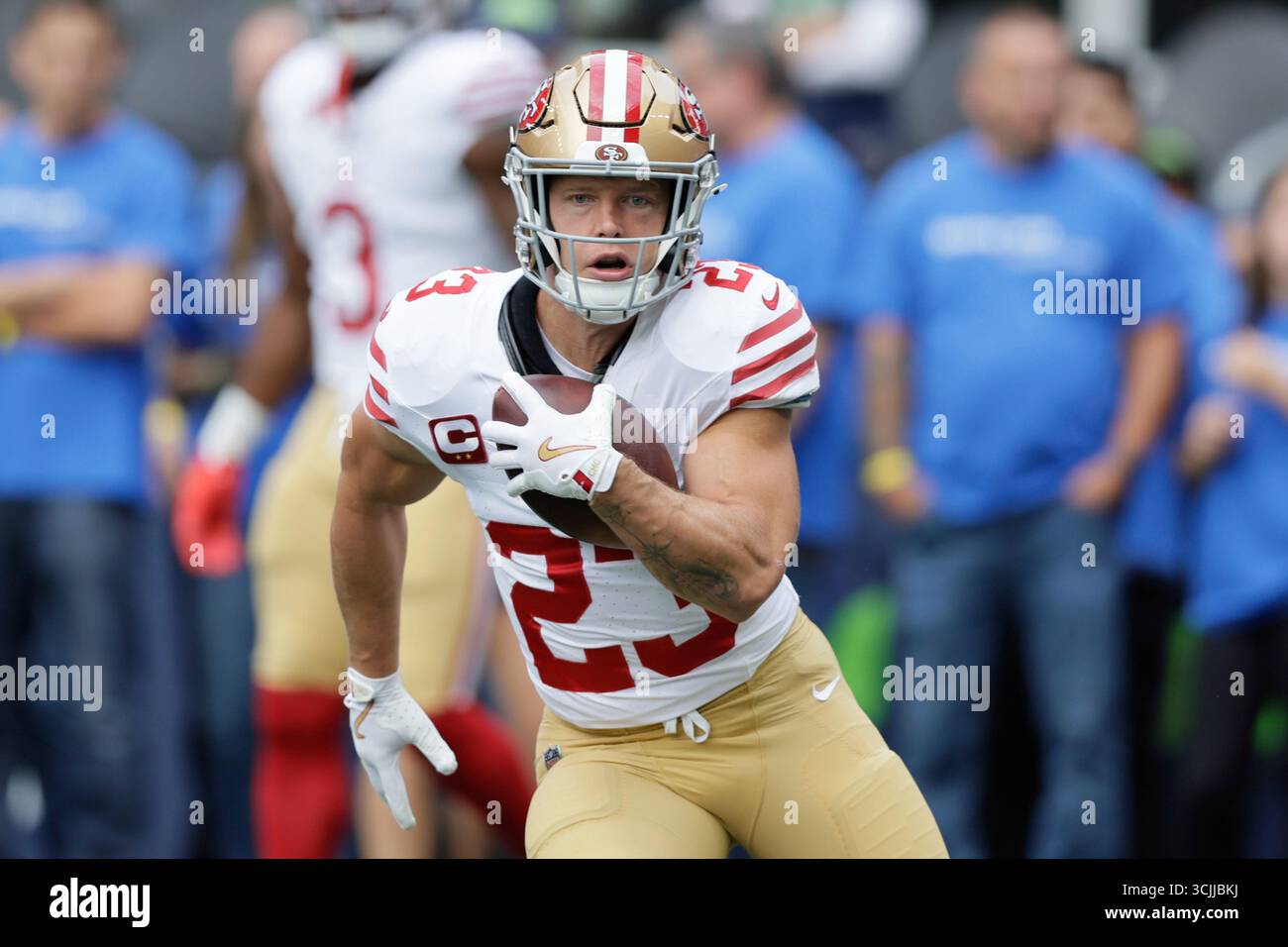 San Francisco 49ers running back Christian McCaffrey (23) warms up ...