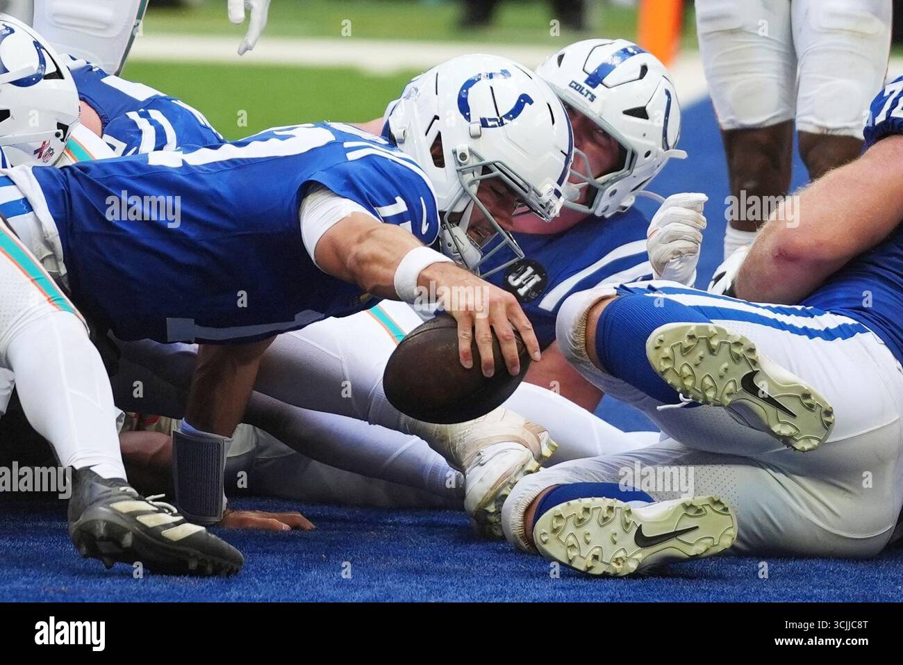 Indianapolis Colts quarterback Daniel Jones (17) scores a touchdown ...