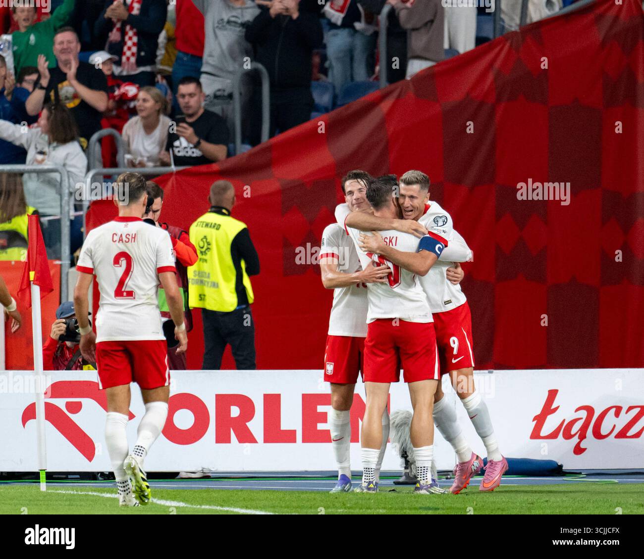 Robert Lewandowski of Poland celebrates scoring with team mates during ...