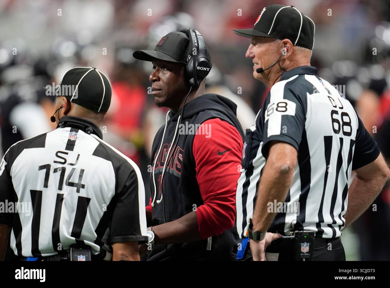 Atlanta Falcons head coach Raheem Morris talks with referees during the ...