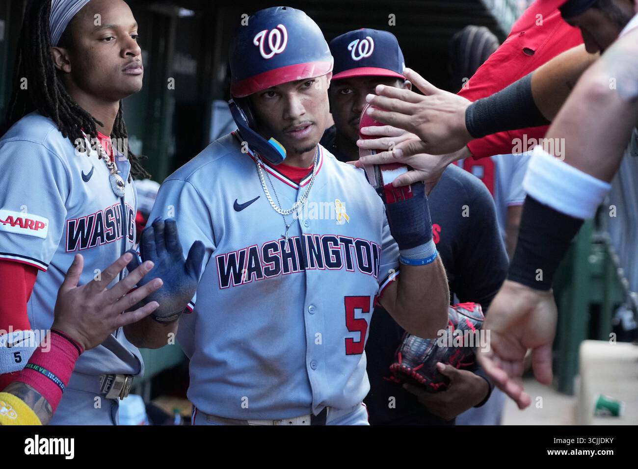 Washington Nationals' Daylen Lile, center, celebrates with teammates ...