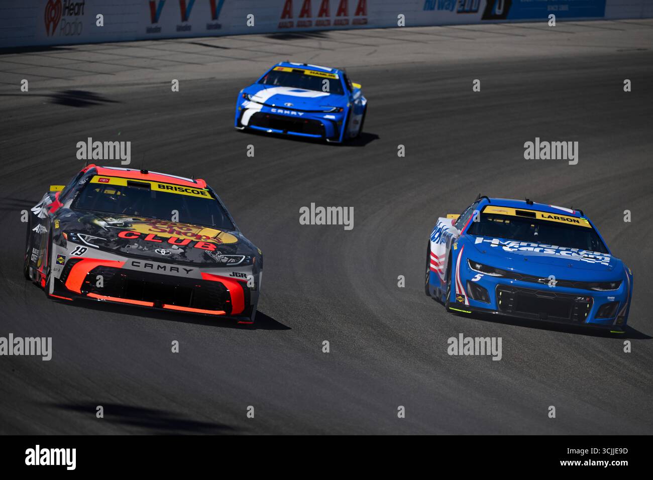 Chase Briscoe (19) and Kyle Larson (5) compete during a NASCAR Cup ...