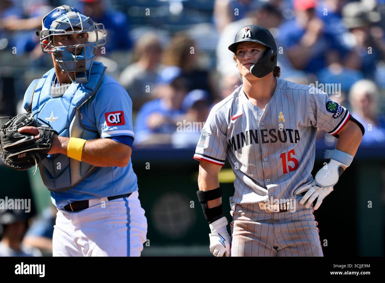 Minnesota Twins' Luke Keaschall (15) reacts after being called out on ...