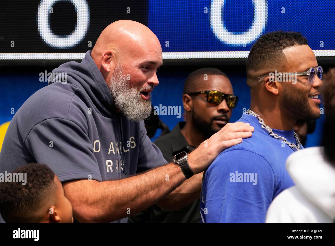 Former Los Angeles Rams players Andrew Whitworth, left, and Aaron ...