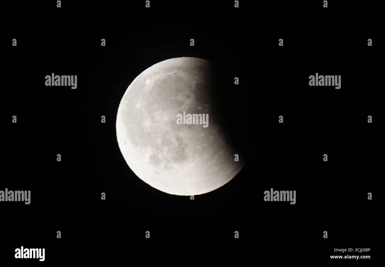 A lunar eclipse "blood moon" visible over Whitley Bay in the North East ...