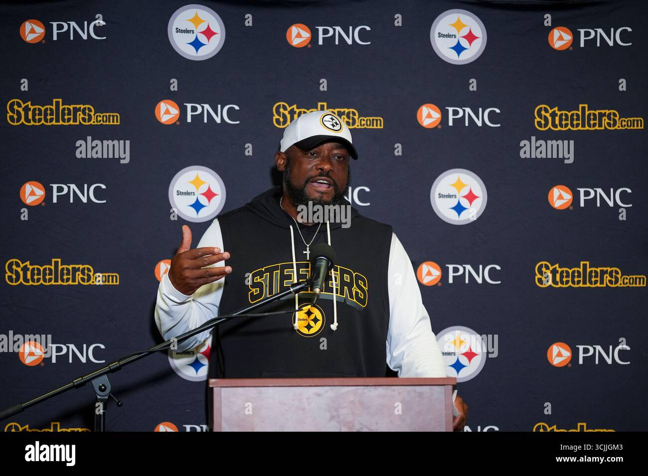Pittsburgh Steelers head coach Mike Tomlin talks to reporters following an NFL football game ...