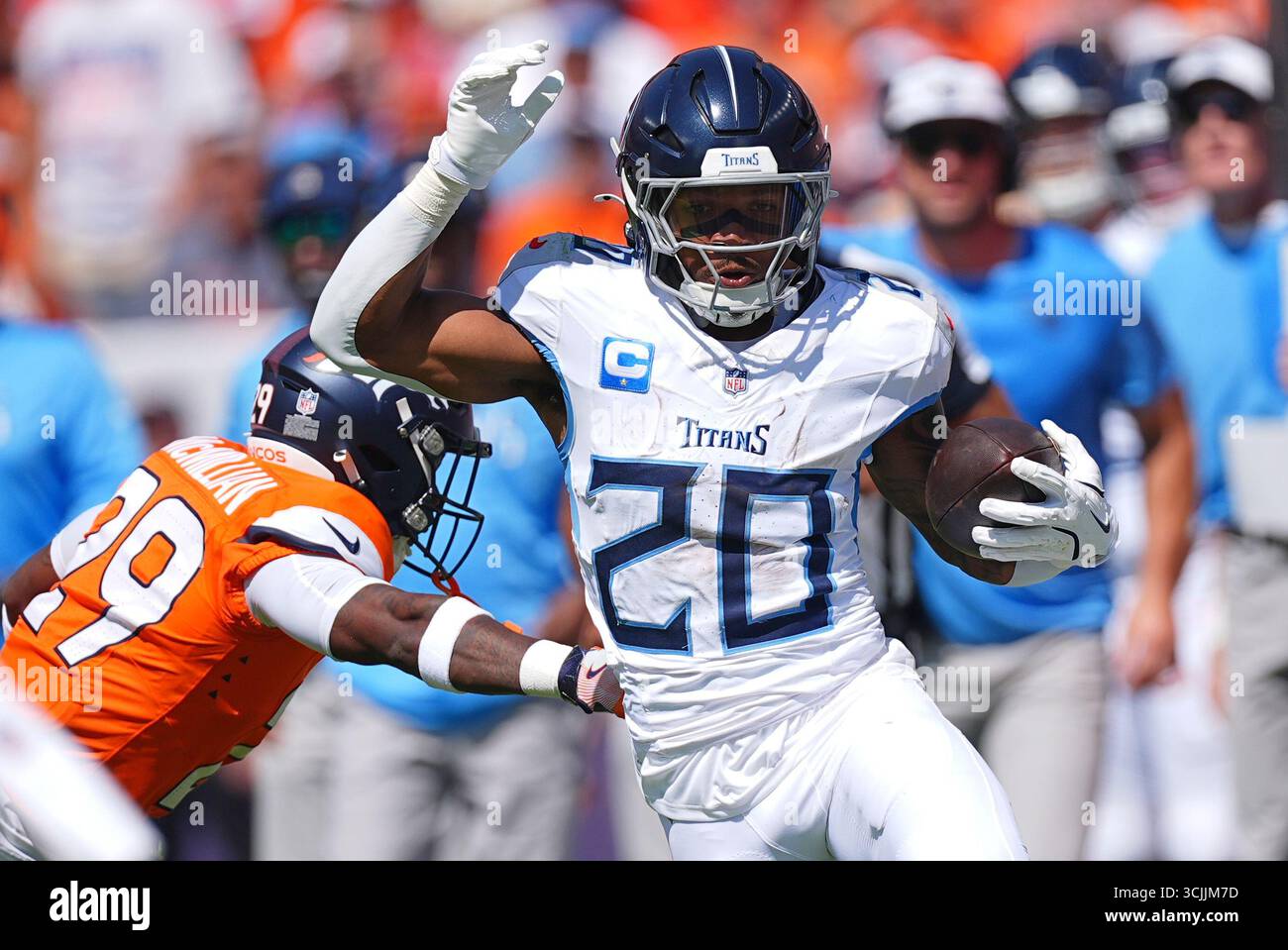 Tennessee Titans running back Tony Pollard (20) runs past Denver ...