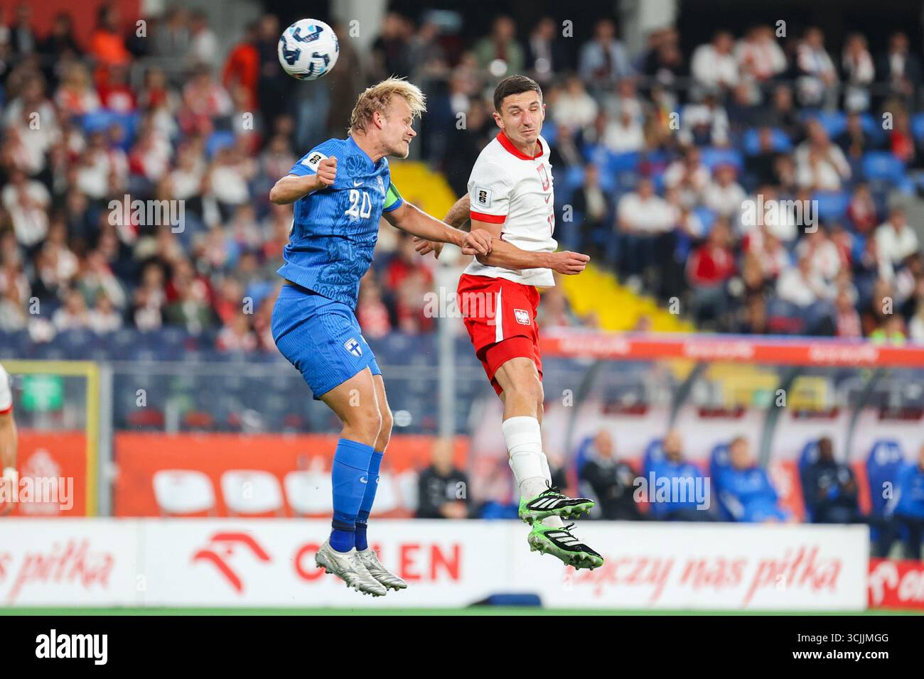 Joel Pohjanpalo (L) of Finland and Bartosz Slisz (R) of Poland are seen ...