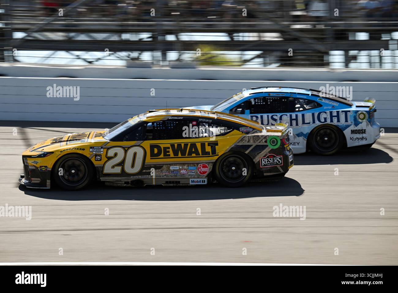 Christopher Bell (20) and Ross Chastain, right, compete during a NASCAR ...