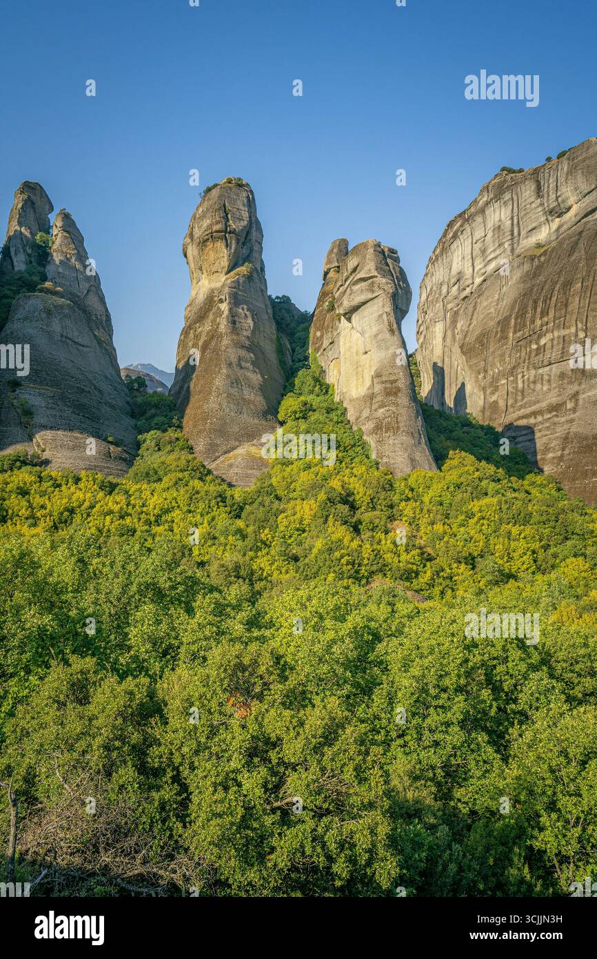 Meteora UNESCO site in Greece with iconic vertical rock towers and lush ...