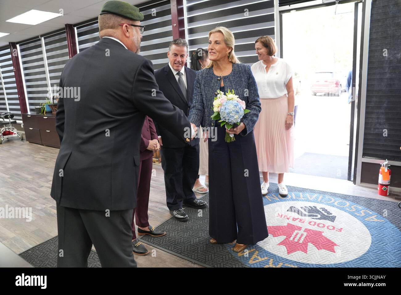 The Duchess of Edinburgh is greeted by board of directors and client ...