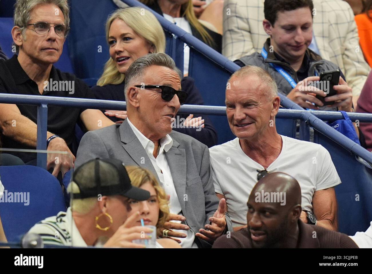 Bruce Springsteen, left, and Sting, right, attend the men's singles ...