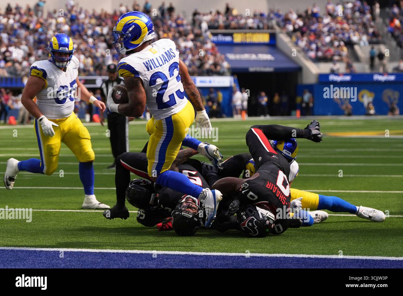 Los Angeles Rams running back Kyren Williams (23) scores against the ...