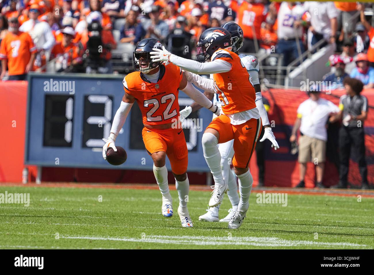 Denver Broncos safety Brandon Jones (22) celebrates a fumble recovery ...