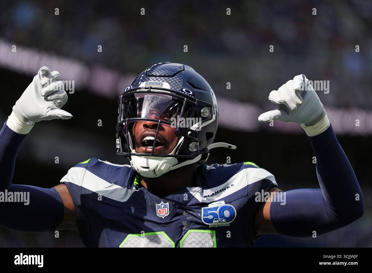 Seattle Seahawks cornerback Devon Witherspoon (21) reacts after a ...