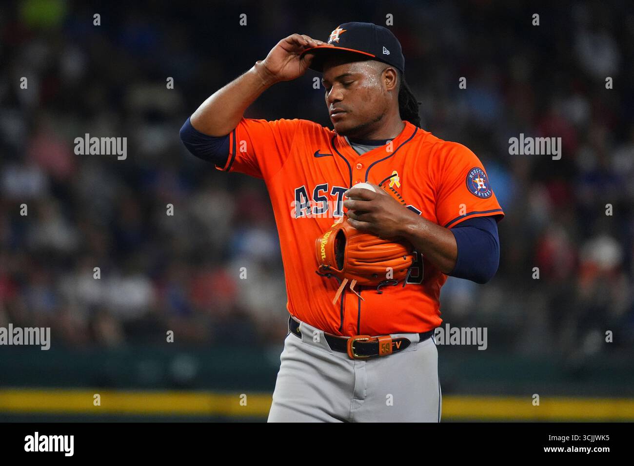 Houston Astros starting pitcher Framber Valdez adjust his cap after ...