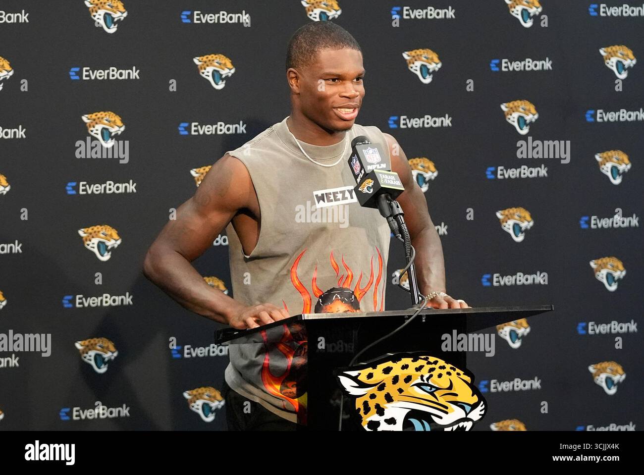 Jacksonville Jaguars wide receiver Travis Hunter (12) speaks in a press ...