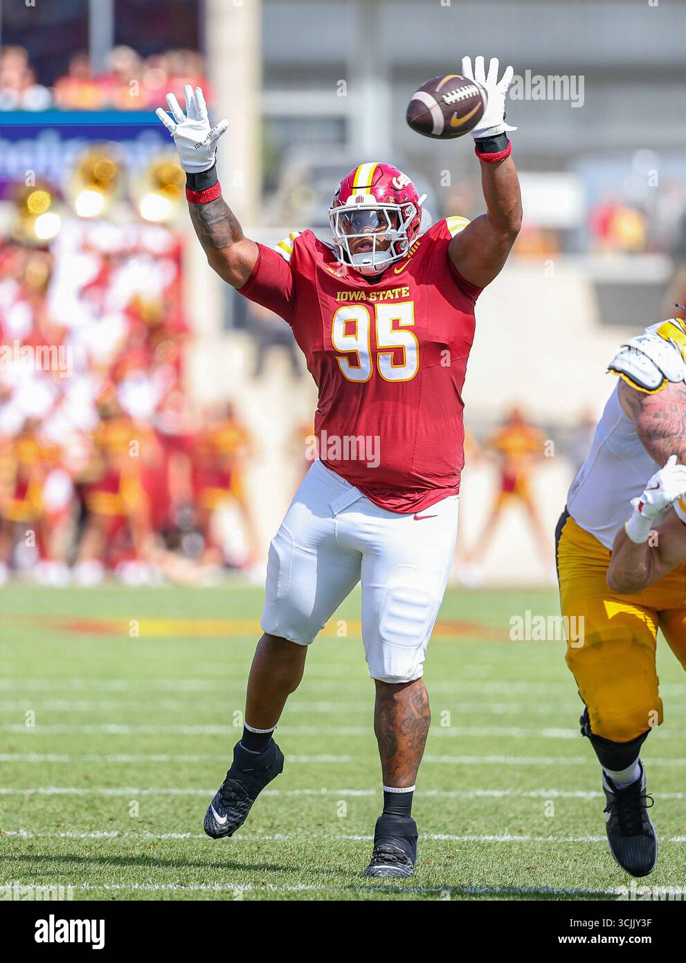 September 6, 2025: Iowa State's Domonique Orange (95) tries to bat down ...