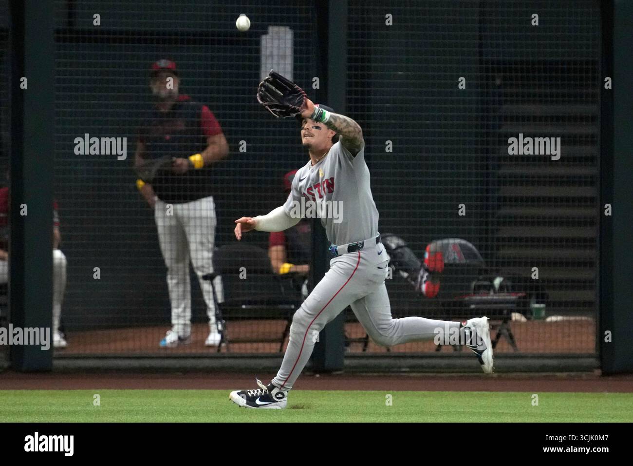 Boston Red Sox left fielder Jarren Duran makes a running catch on a ...