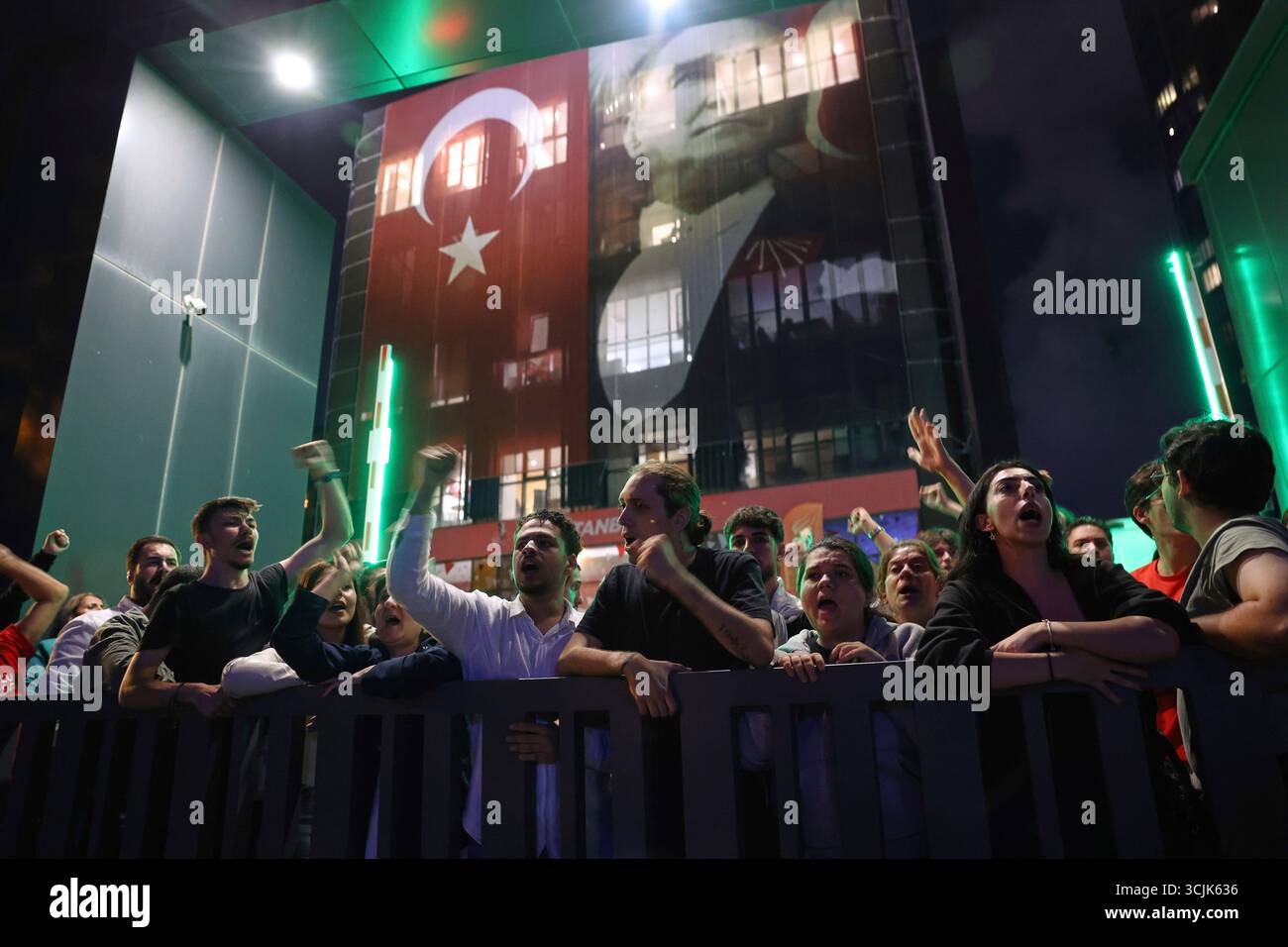 Turkey's main opposition CHP party supporters chant slogans outside the ...