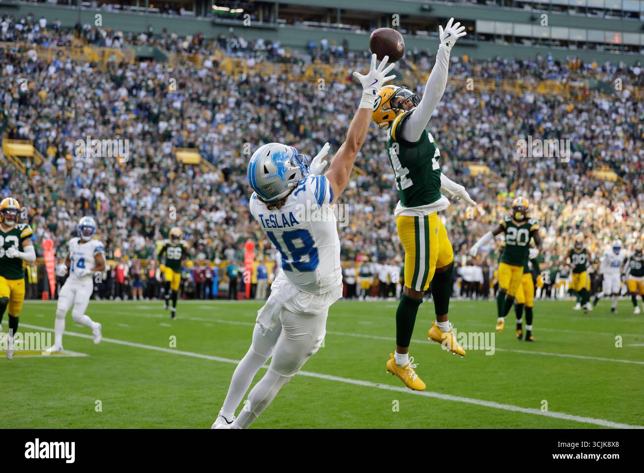 Detroit Lions wide receiver Isaac TeSlaa (18) catches a 13-yard ...