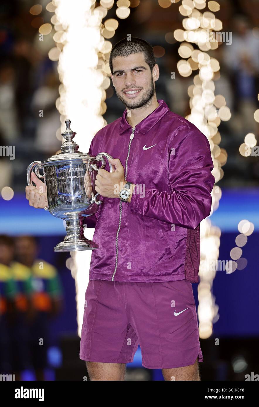 Carlos Alcaraz of Spain poses with the victor's trophy after winning ...