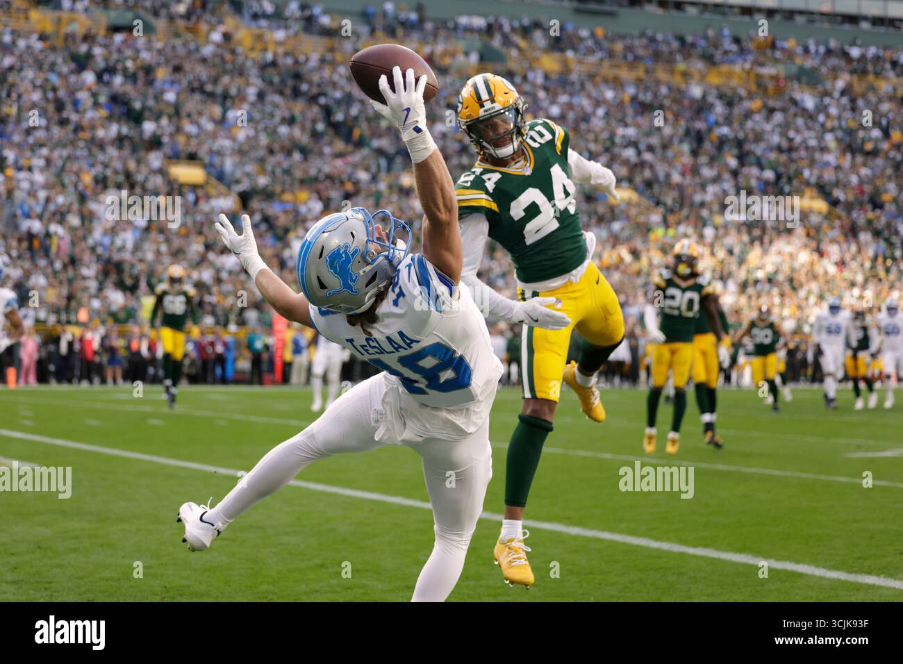 Detroit Lions wide receiver Isaac TeSlaa (18) catches a 13-yard ...