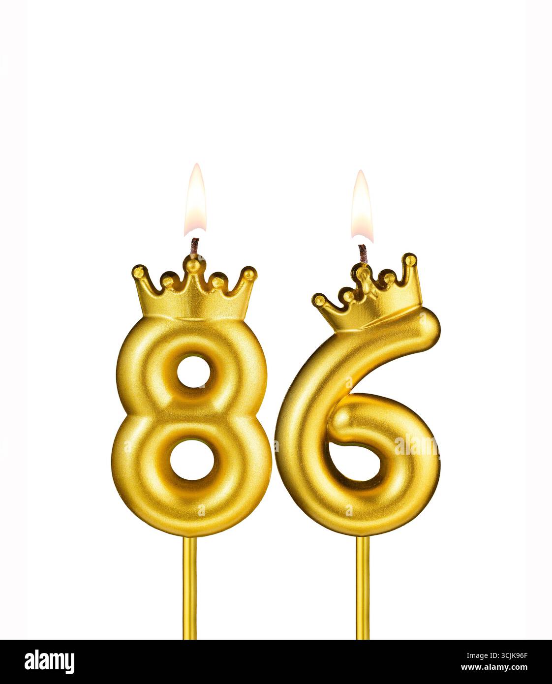 Golden candle with crown number 86 - White background Stock Photo - Alamy