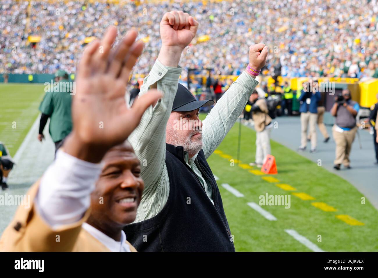 Former Green Bay Packers head coach Mike McCarthy, right, and former ...