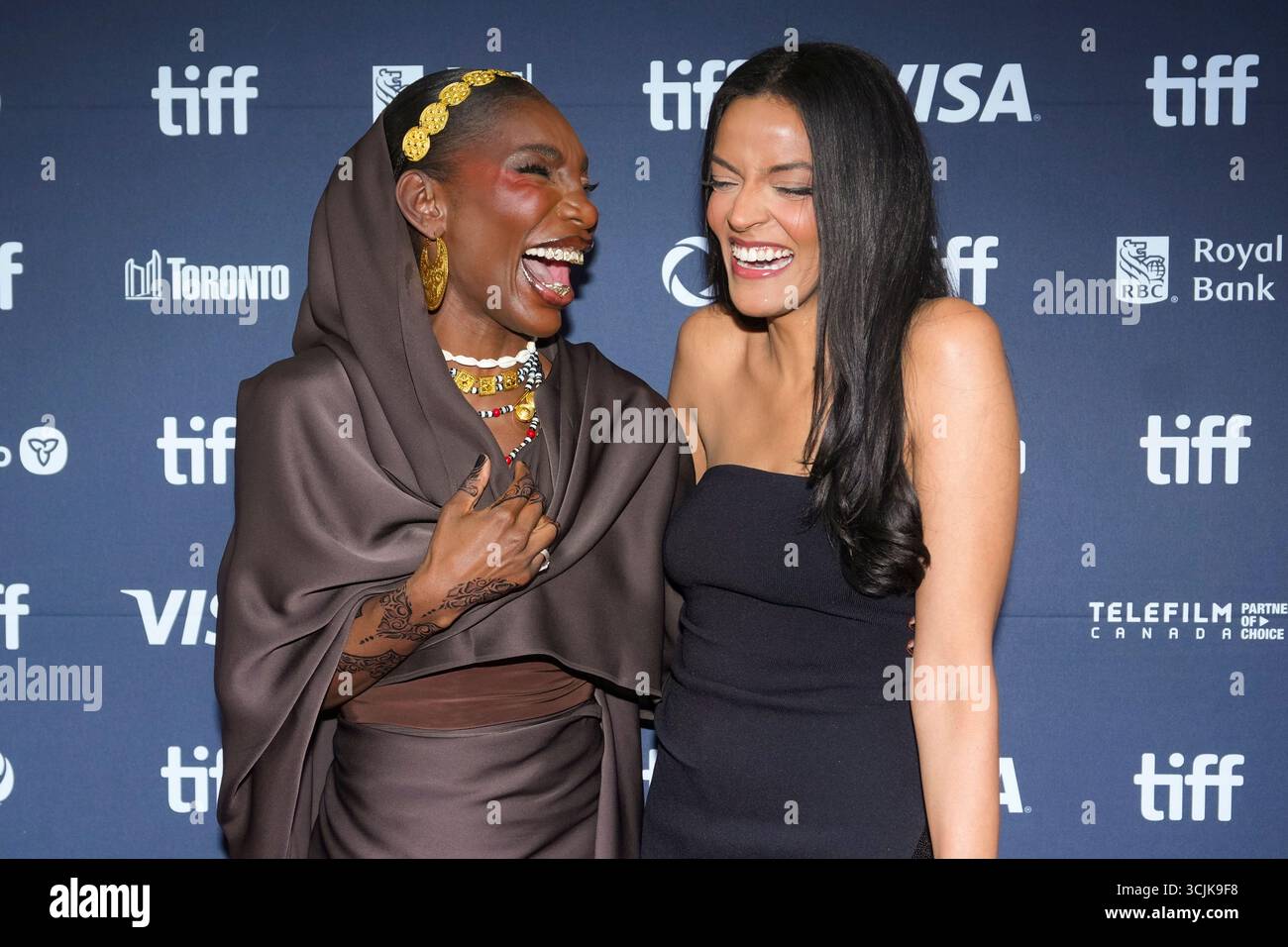 Michaela Coel, left, is photographed with her friend Ebaa El Melik as ...