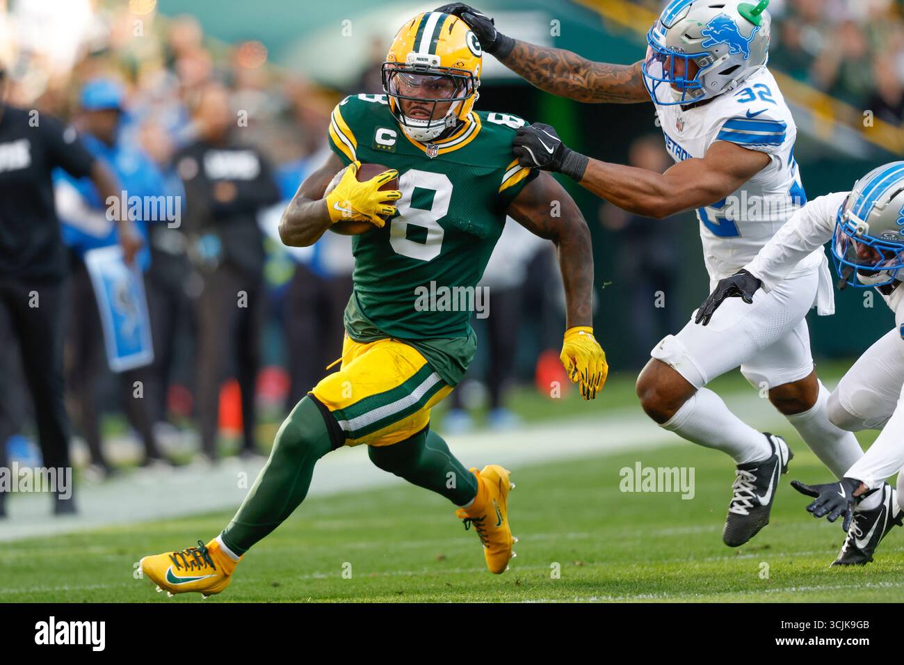 Green Bay Packers running back Josh Jacobs (8) runs against the Detroit ...