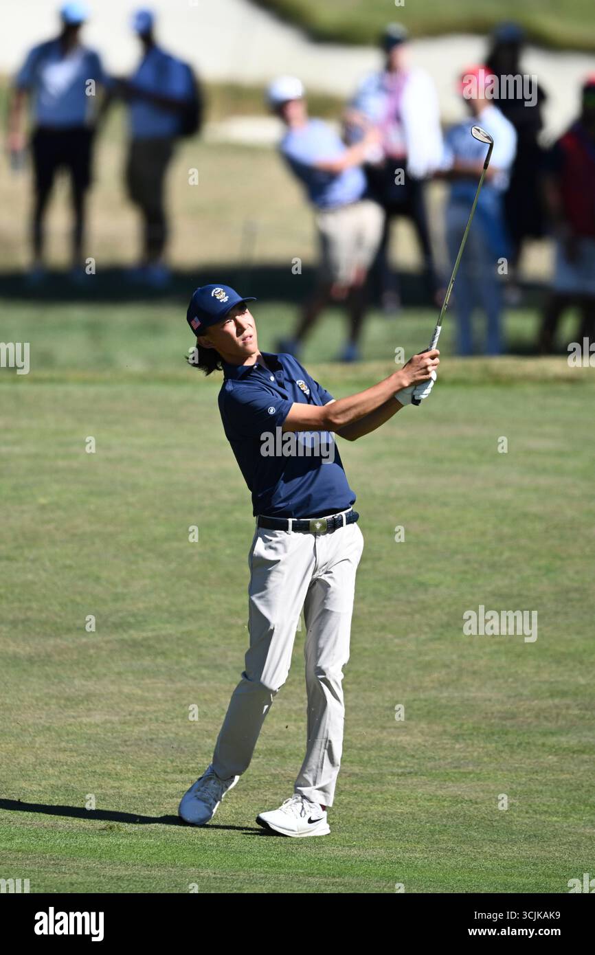 The USA team's Ethan Fang follows his shot on the sixth hole during ...