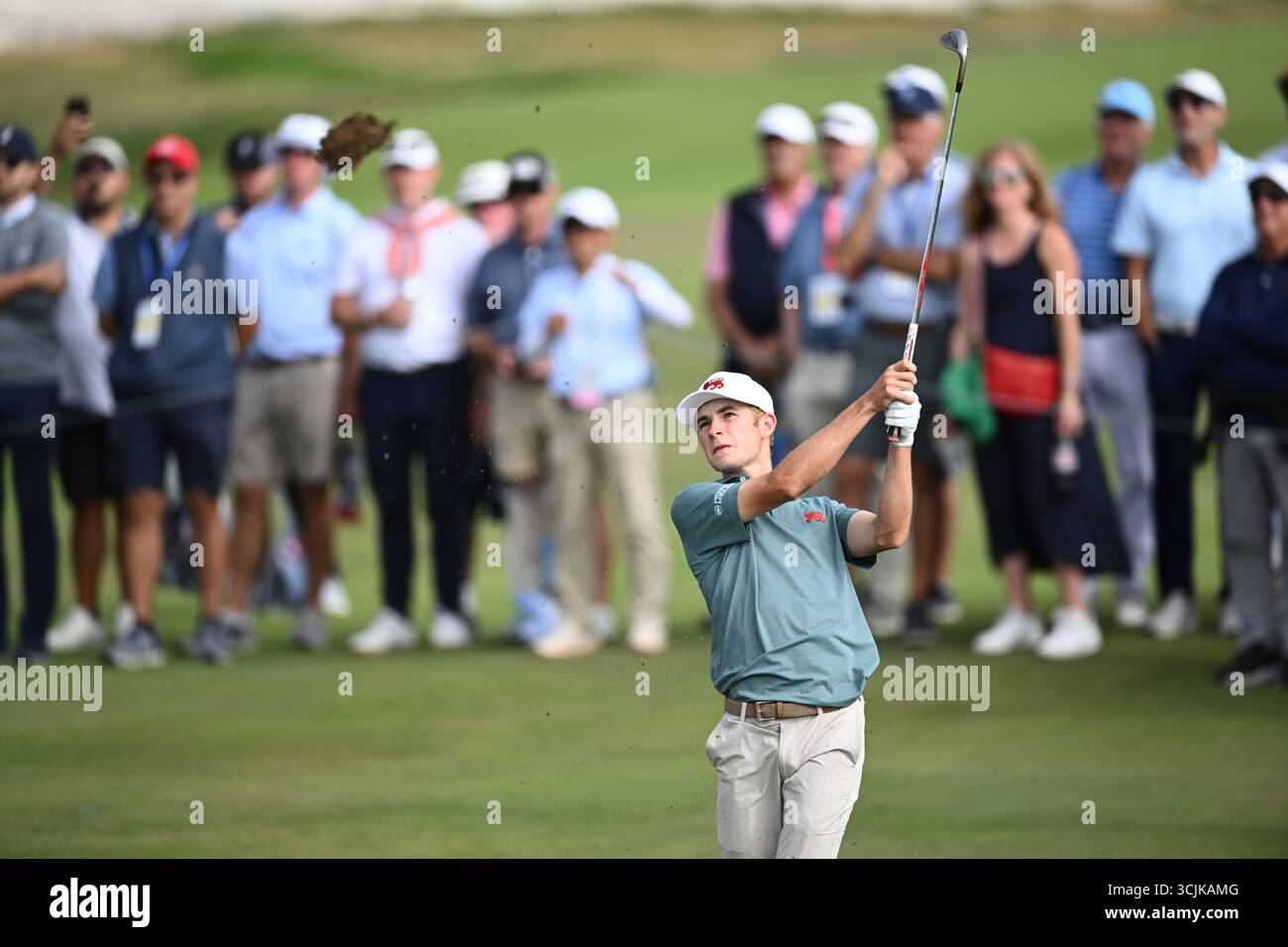 The Great Britain and Ireland team's Connor Graham follows his shot on ...
