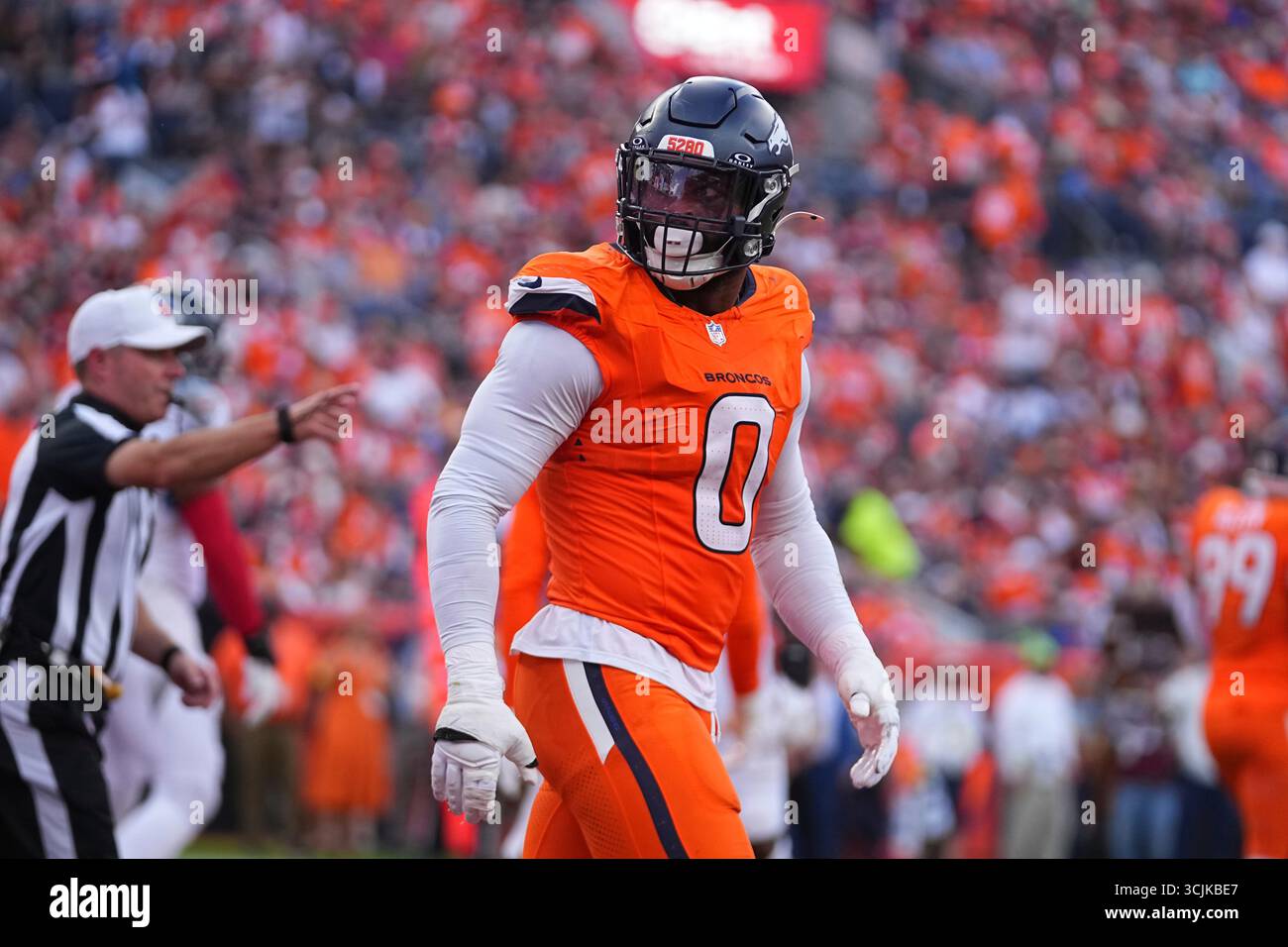 Denver Broncos linebacker Jonathon Cooper (0) reacts to a play against ...