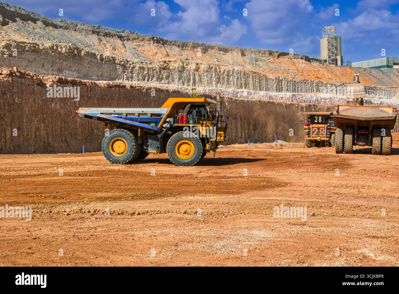 trucks getting loaded with kimberlite, excavator, open pit mine, large ...