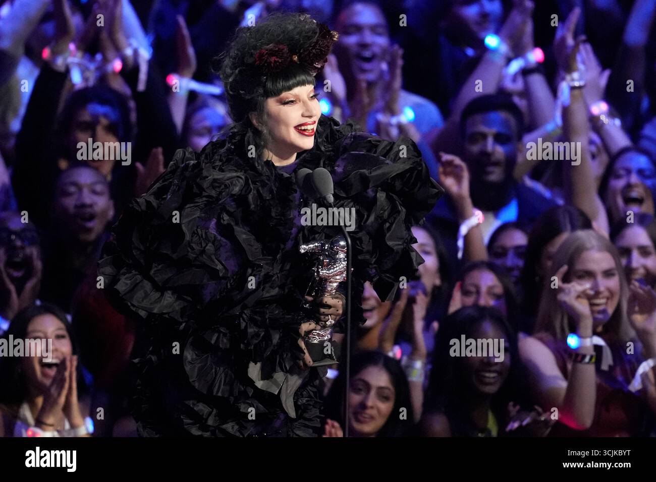 Lady Gaga accepts the award for artist of the year during the MTV Video ...