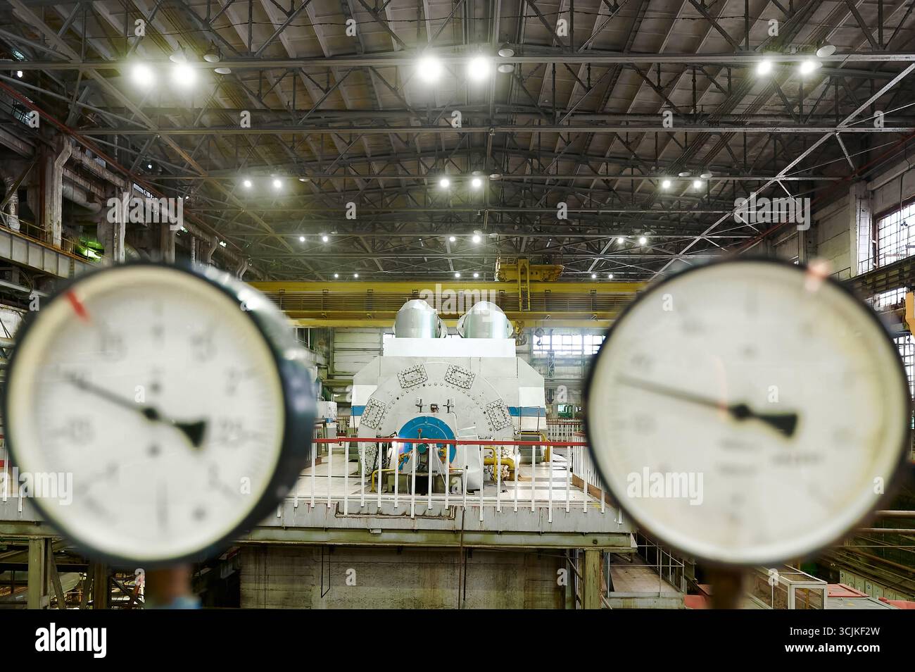 Analog pressure gauges in an industrial setting highlight equipment ...