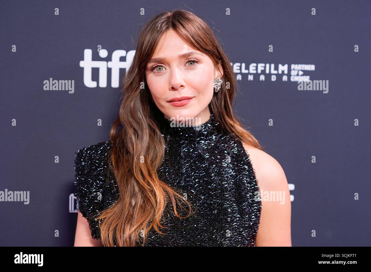 Elizabeth Olsen attends the premiere of "Eternity" during the Toronto ...