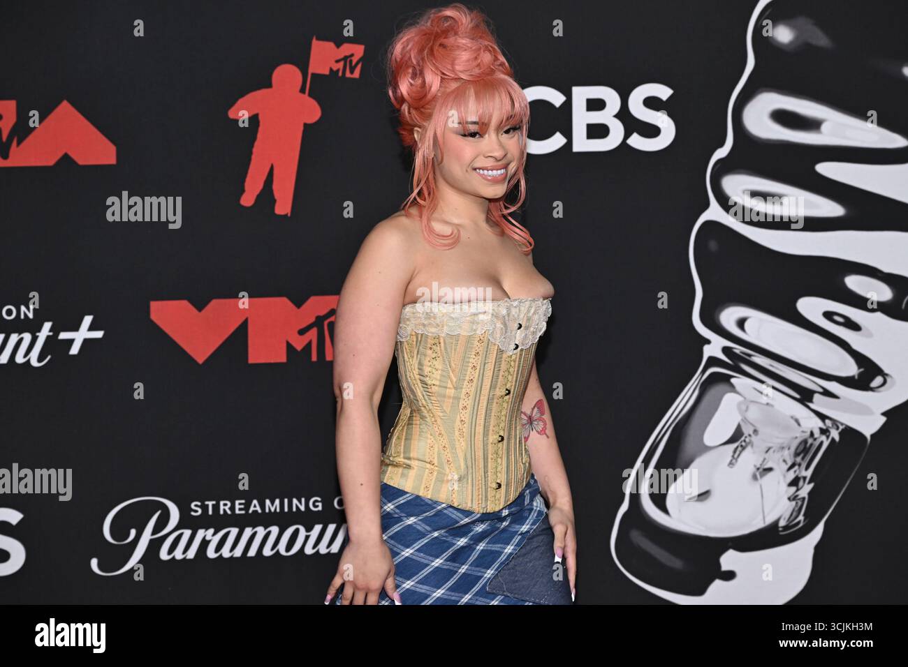 Ice Spice poses in the press room during the MTV Video Music Awards on ...