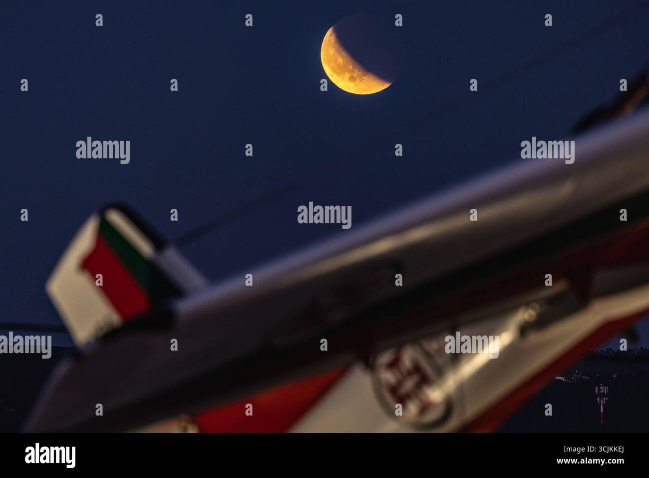 A red full moon, also known as a blood moon, is seen during a lunar ...