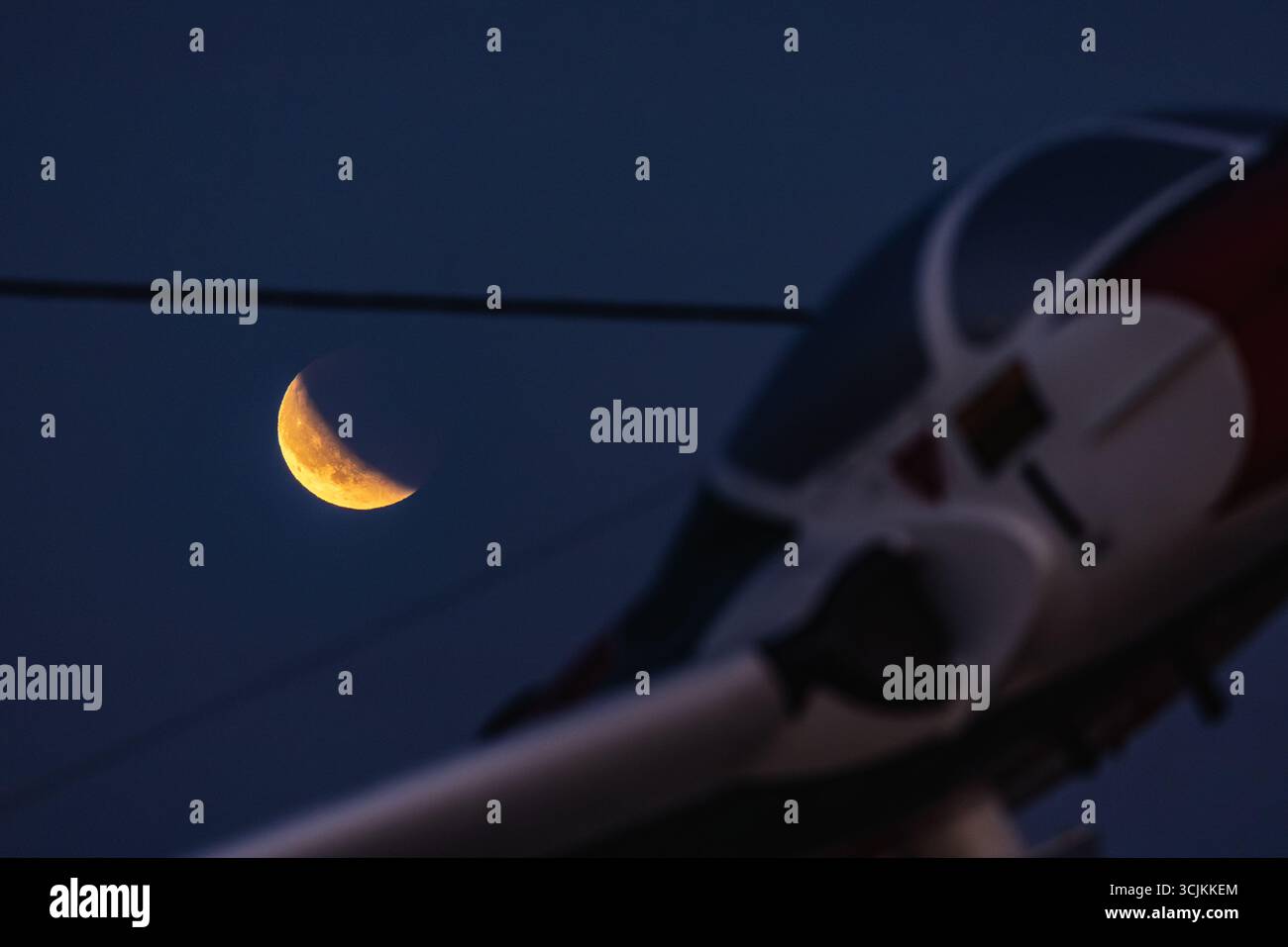 A red full moon, also known as a blood moon, is seen during a lunar ...