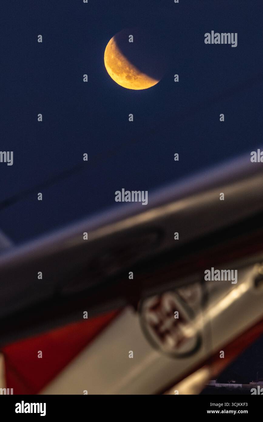 A red full moon, also known as a blood moon, is seen during a lunar ...