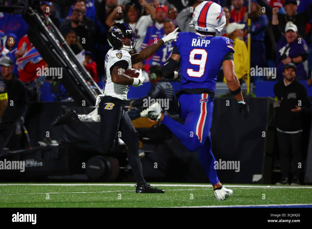 Baltimore Ravens wide receiver Zay Flowers (4) runs past Buffalo Bills ...