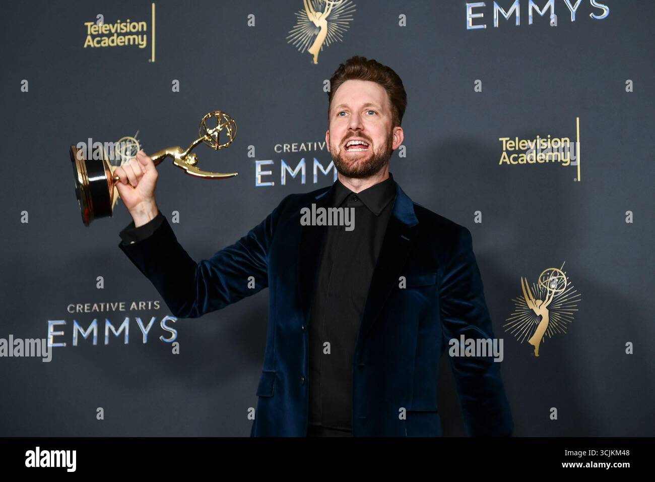 Jordan Klepper poses in the press room with the award for outstanding ...